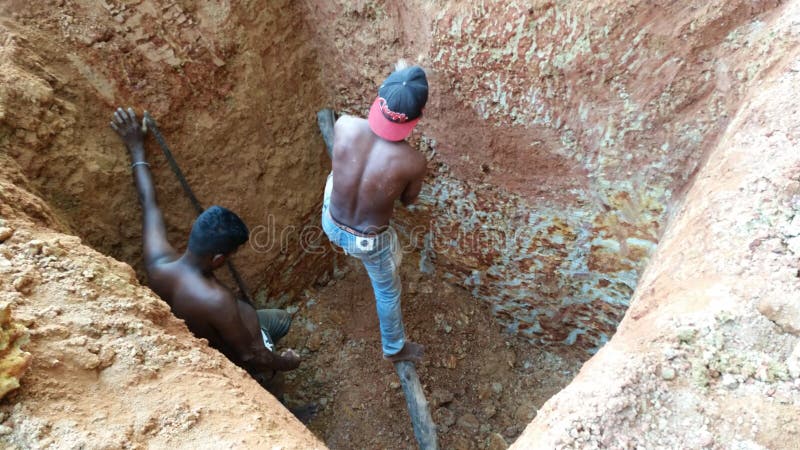 Manual digging water well editorial stock image. Image of site - 97617524