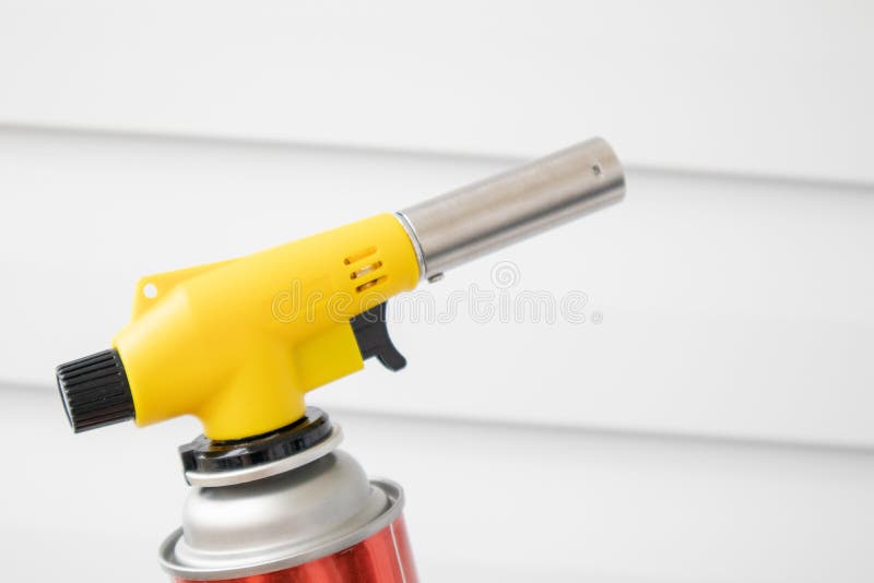 Manual Gas Torch Burner on Spray Can with Blue Flame on White Stock ...
