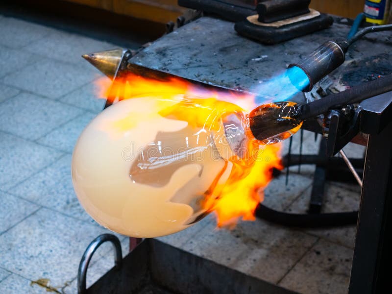 Manual Glassblowing Process. Man Working on a Big Glass Art Stock Image ...