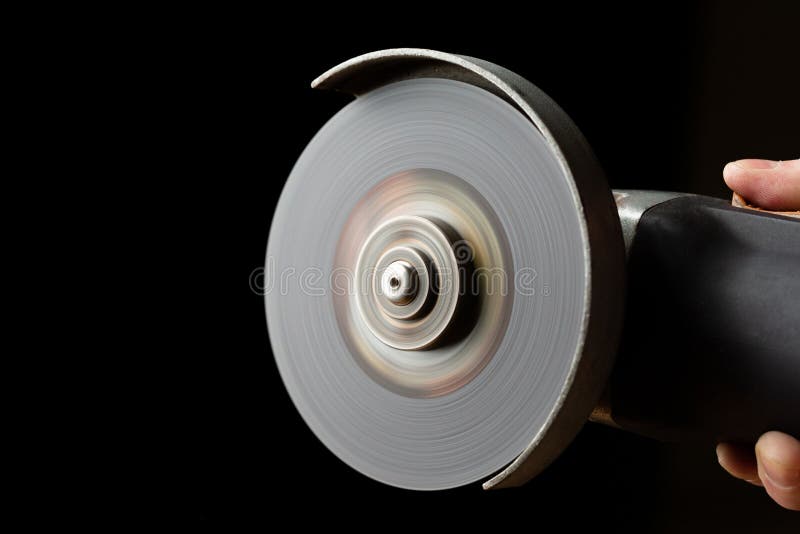 Manual Grinding Machine with Cutting Wheel in the Hand of a Working ...