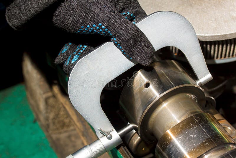 Manual Inspection of a Crankshaft with a Micrometer Stock Image - Image ...