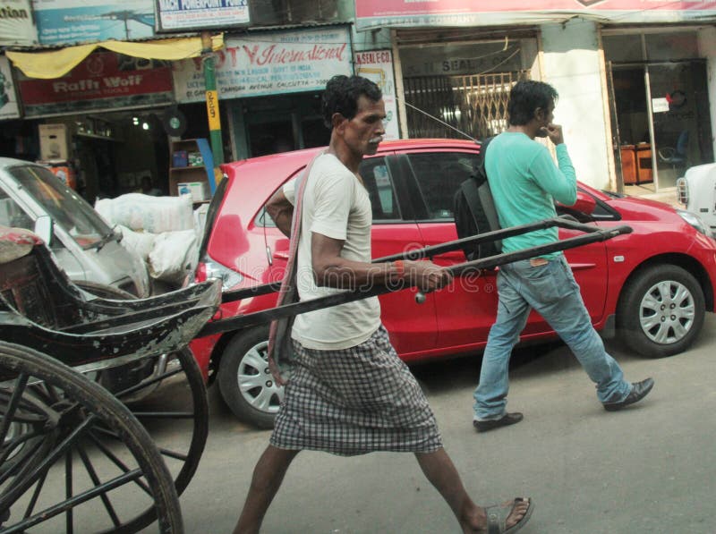 Pulling a Rickshaw in heat editorial image. Image of goods - 54340980