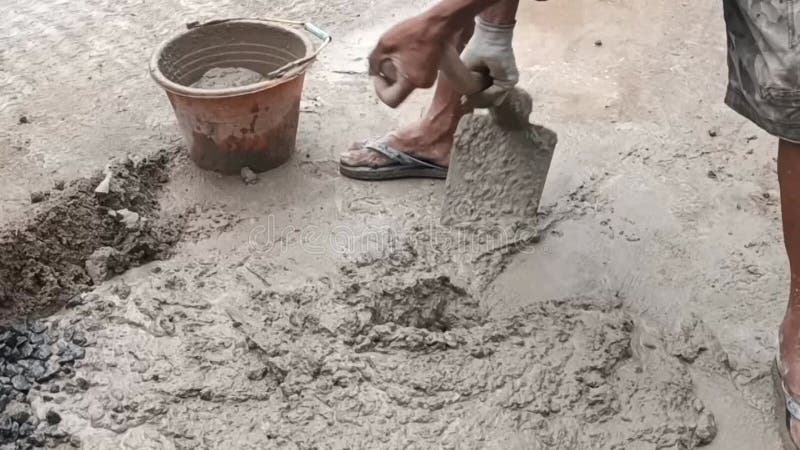 Manual Cement and Sand Mixing Process for Construction Stock Footage ...