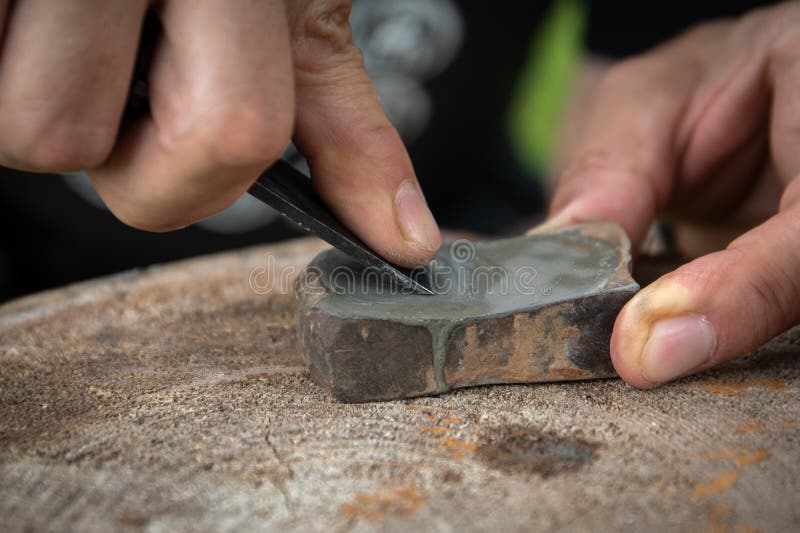 Manual Sharpening of Forged on a Grinding Stone. Hand Tools Stock Image ...