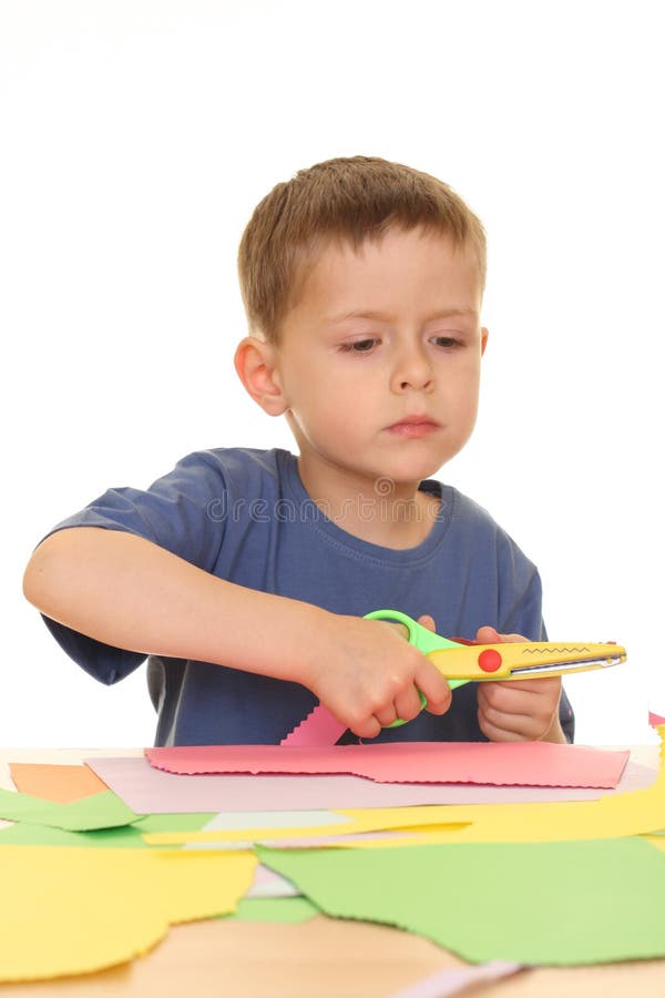 Boy making paper bird stock photo. Image of handmade - 19325380