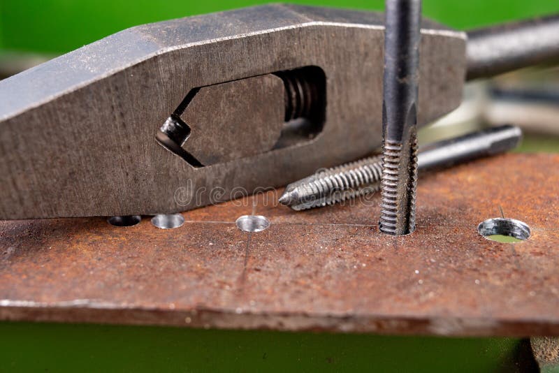 Manual Thread Cutting in Metal. Locksmith Accessories for Small Work in ...