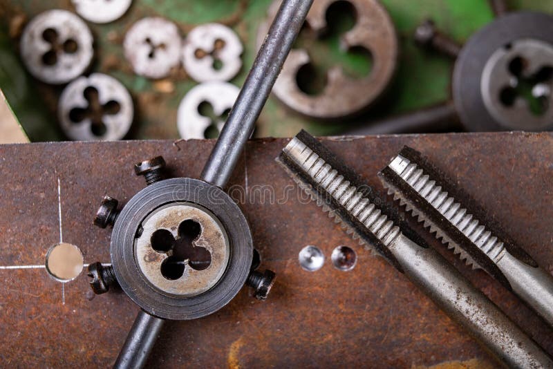 Manual Thread Cutting in Metal. Locksmith Accessories for Small Work in ...