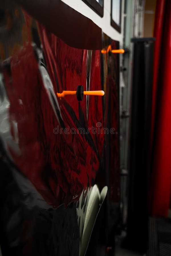 Manual Vinyl Wrap Cutting Using Physical Stencil. Vinyl Wrap is ...