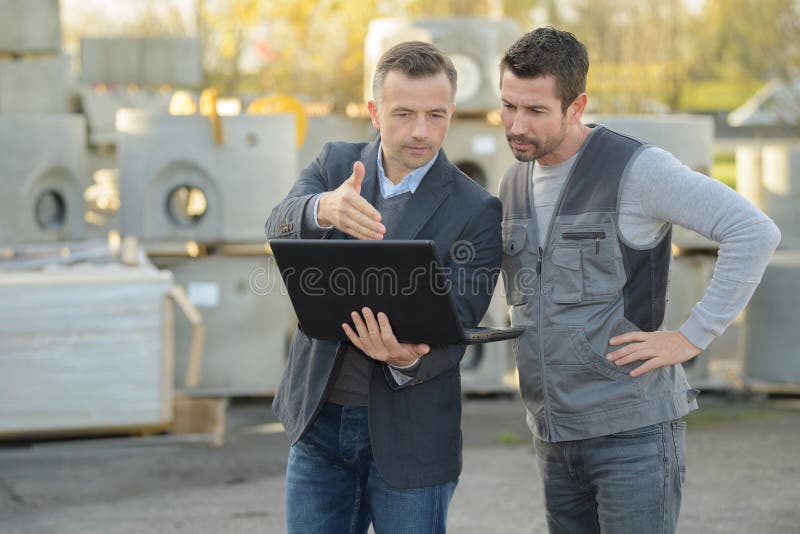 Manual Worker and Boss Outside Warehouse Stock Image - Image of storage ...