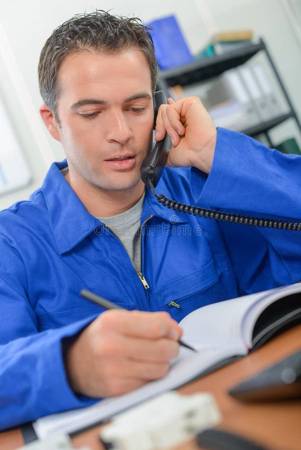 Manual Worker Making Call in Office Stock Image - Image of cell ...