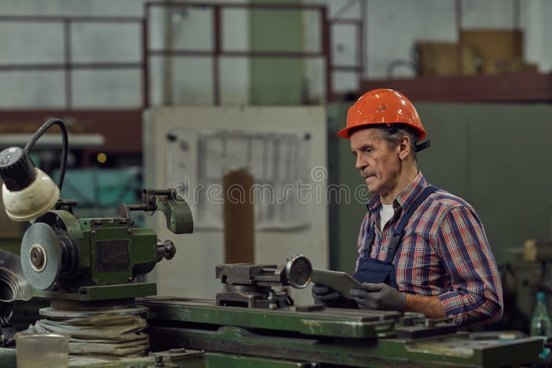 Manual Worker Using Tablet Pc in the Plant Stock Image - Image of ...