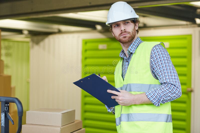Manual Worker Working in the Storage Stock Photo - Image of factory ...