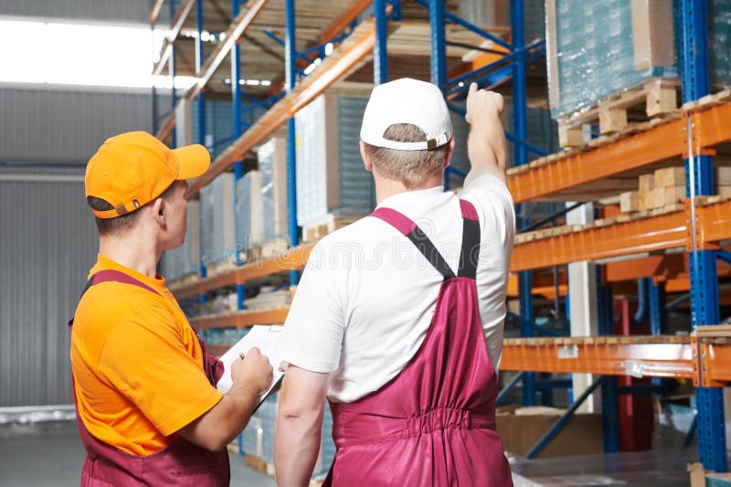 Manual Workers in Warehouse Stock Photo - Image of rack, pointing: 20123474