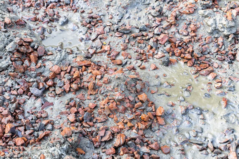 Manualy Mixing Broken Bricks Pile with a Sand Pile and Cement Powder ...