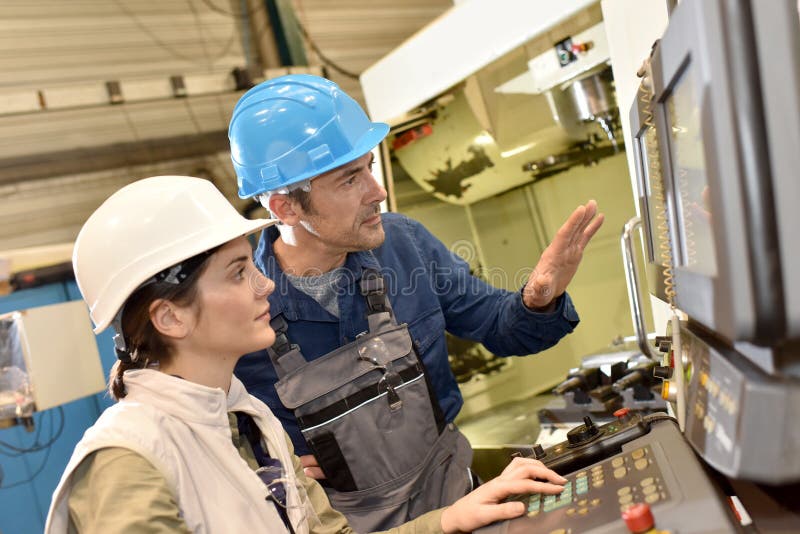 Manufacture Workers Setting Up Machinery Stock Image - Image of people ...