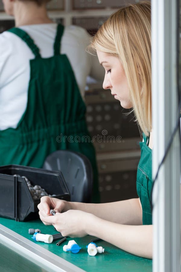 Female Assembly Line Workers Stock Photo - Image of female, indoor ...