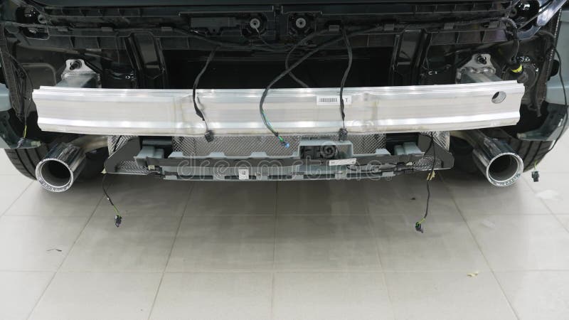 Car Assembly Line Showing Installing Bumper in Slow Motion Stock ...