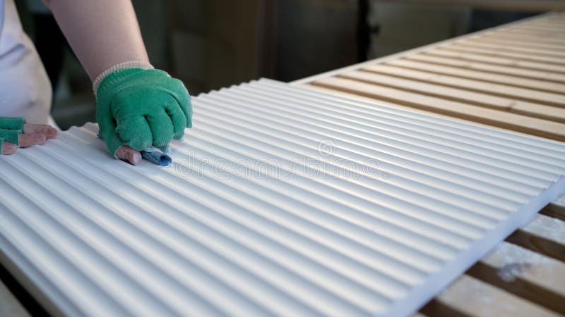 Worker Sanding a White Wooden Panel on a Workbench Stock Photo - Image ...