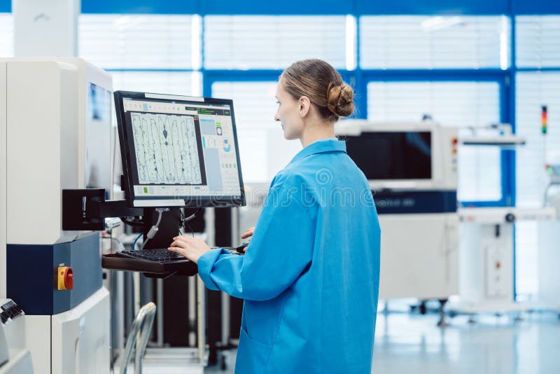 Manufacturing Worker Checking Data of Assembly Line on Screen Stock ...