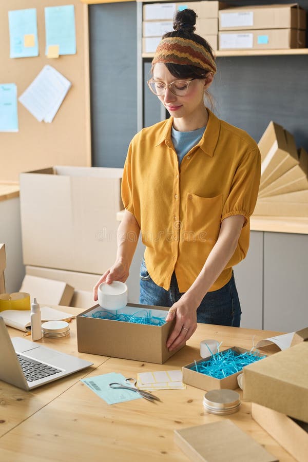 Manufacturing Worker Putting Packed Products in Boxes Stock Image ...