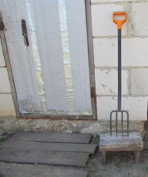 Manure Fork with Yellow Handle Stock Photo - Image of outdoors, fork ...