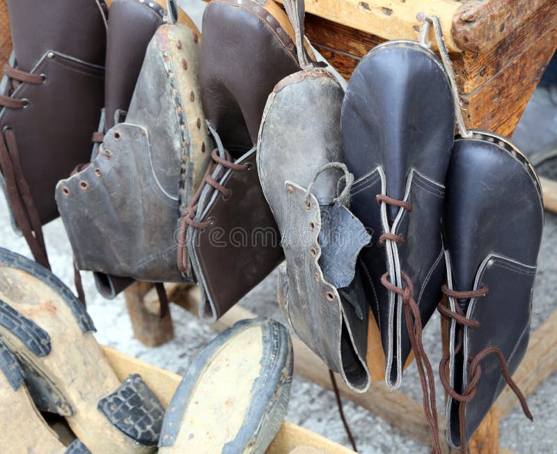 Many Ancient Shoes in the Workshop of a Shoemaker Stock Image - Image ...