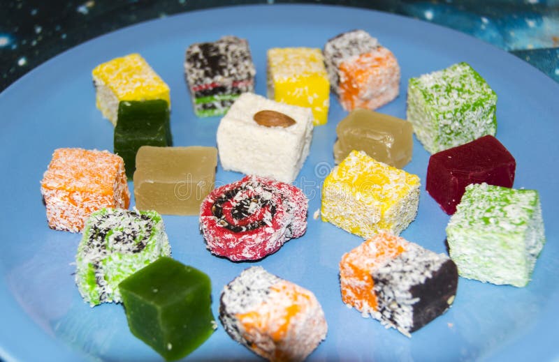 Many Assorted Multicolored Turkish Delight on Blue Background Stock ...