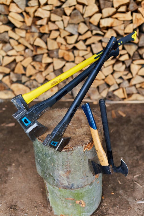 Many axes on a stump stock photo. Image of bark, logging - 217444098