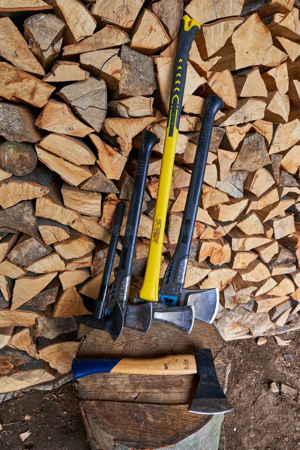 Many axes on a stump stock photo. Image of large, nature - 217444120