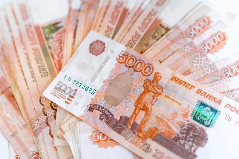 Many Banknotes with a Face Value of 5000 Rubles are on the Table, Top ...