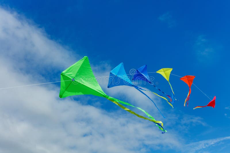 Many Beautiful Colorful Kites Fly Over Blue Sky and Clouds Stock Image ...