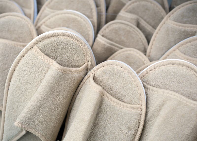 Many Beige Indoor Slippers Made of Fabric Stock Photo - Image of indoor ...