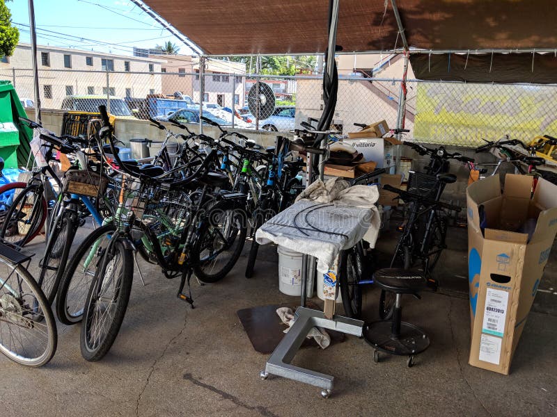 Many Bicycles under repair editorial stock image. Image of city - 265206609