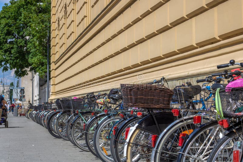 Many bikes on the street stock photo. Image of lots - 117476790