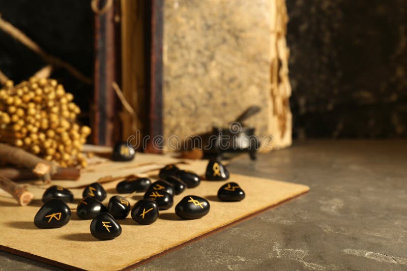 Many Black Rune Stones on Grey Table. Space for Text Stock Photo ...