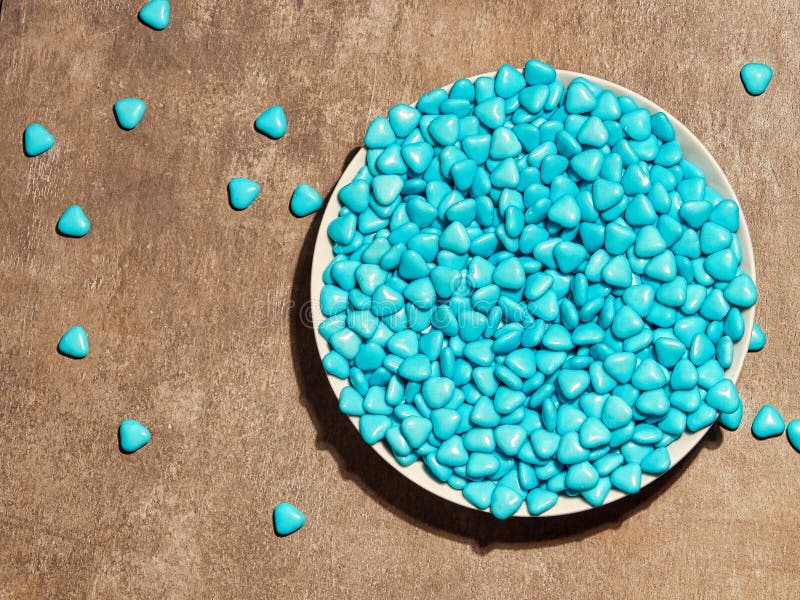 Many Blue Candies in the Shape of Hearts Stock Photo - Image of snack ...