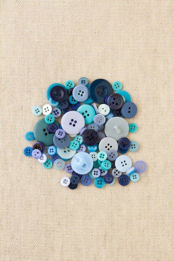 Pile of Blue Buttons on Hessian Stock Image - Image of fashion, item ...