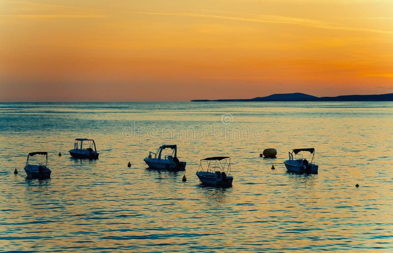 Many boats at sunset stock image. Image of boats, transport - 311648379