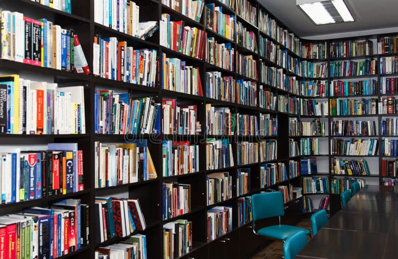 Many Books Lying on Shelves in Reading Room in Library Editorial Stock ...