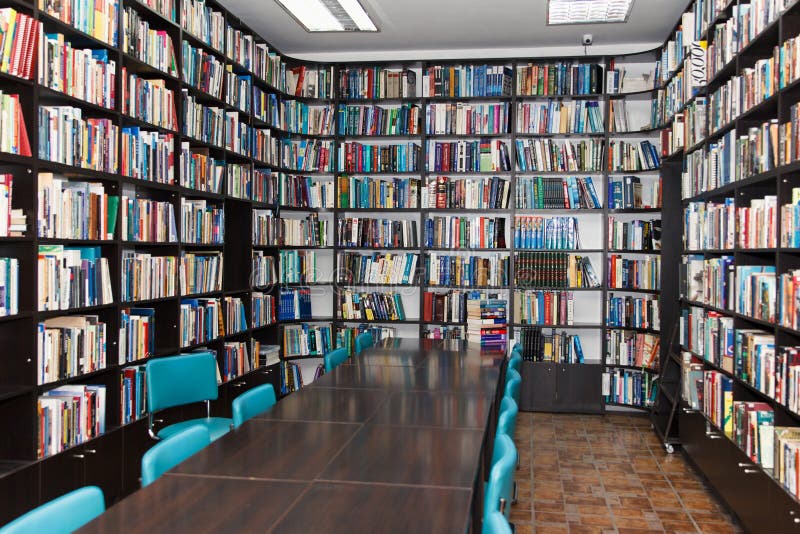 Many Books Lying on Shelves in Reading Room in Library Editorial Stock ...