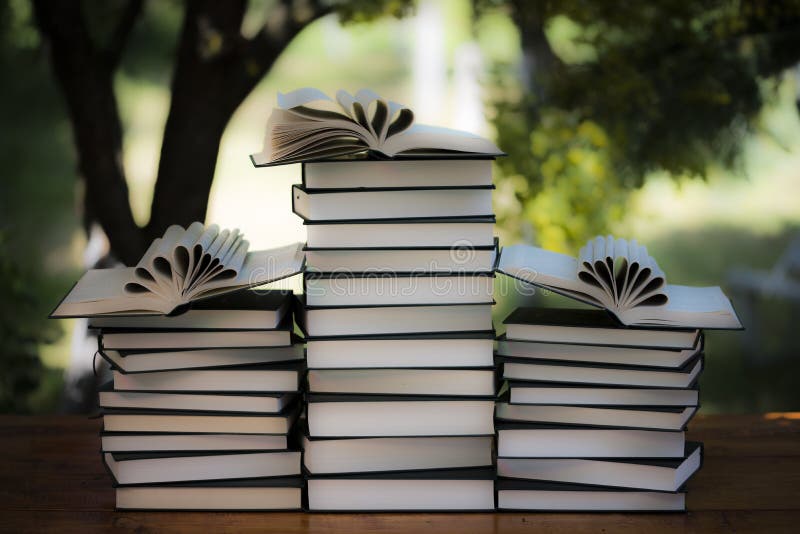 A Stack of Many Old Books on the Table-background of Bookshelve Stock ...