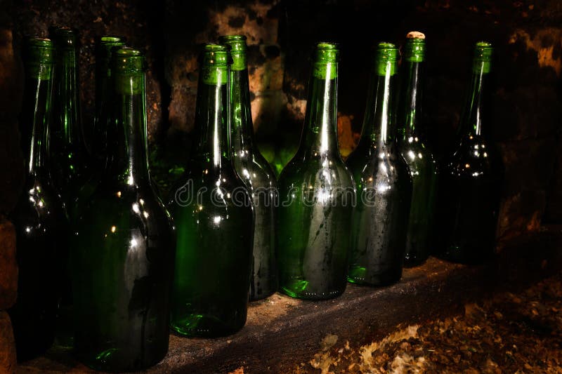 Many Bottles of Alcohol Drinks on Shelf in Cellar Stock Photo - Image ...