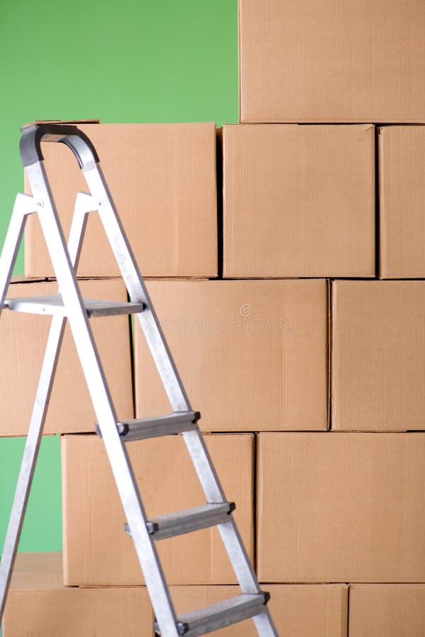 The Many Boxes and Ladder in Depot Stock Image - Image of green, helmet ...