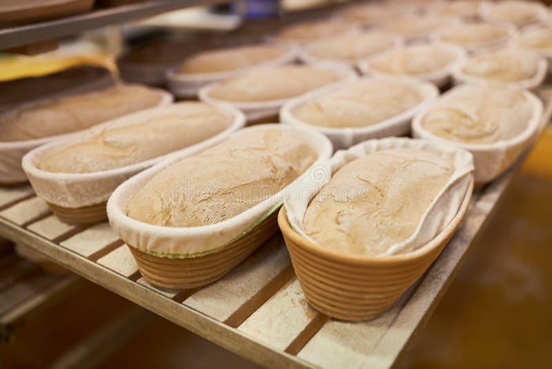 Many Bread Loaves on a Shelf in the Bakery Stock Photo - Image of ...
