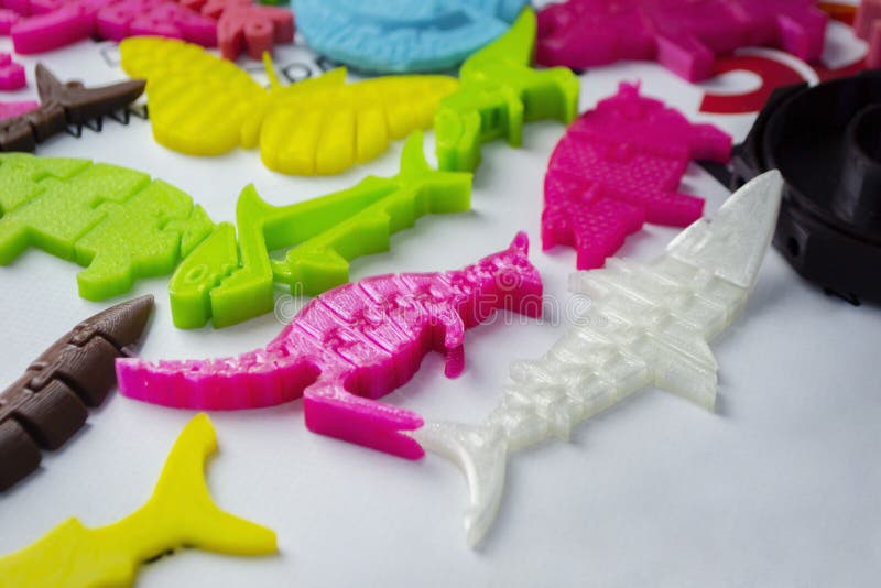 Many Bright Multi-colored Objects Printed on 3d Printer Lie on Flat ...