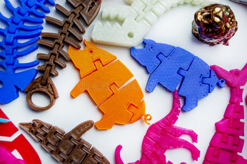 Many Bright Multi-colored Objects Printed on 3d Printer Lie on Flat ...