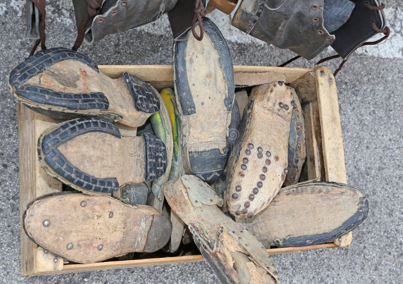 Many Broken Shoes in the Workshop of a Shoemaker Stock Photo - Image of ...