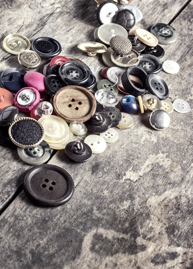 Many Brown Button on Wooden Table. Stock Photo - Image of large, focus ...
