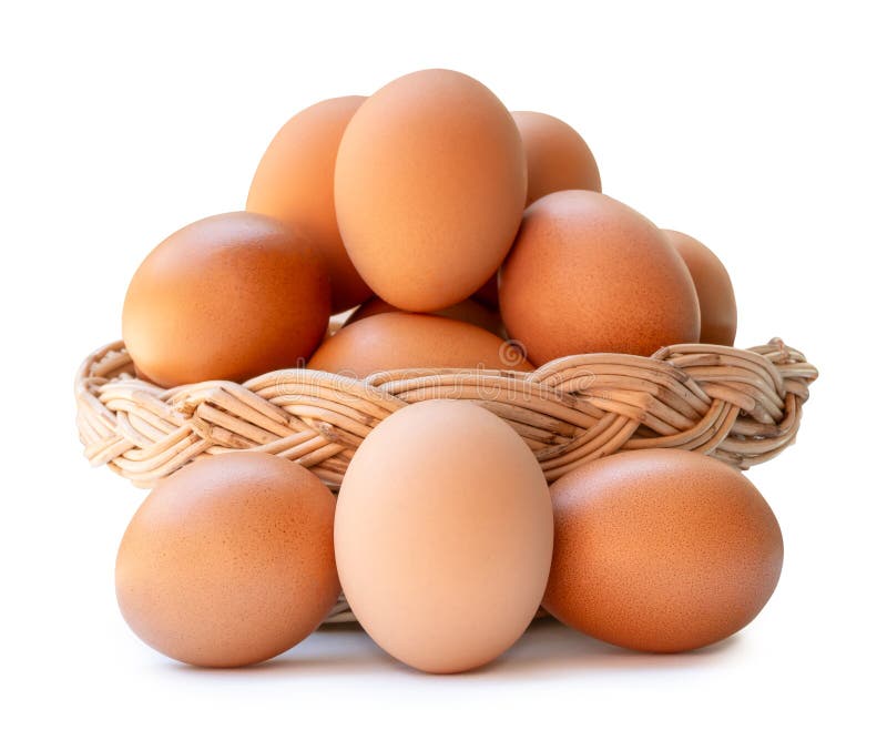 Many Brown Chicken Eggs in Stack in Wicker Basket Isolated on White Background with Clipping ...