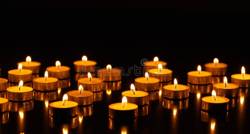 Many burning candles stock photo. Image of dark, heat - 63061650